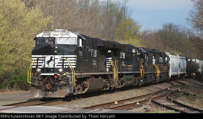 NS 18G is eastbound at the Lansdown Road grade crossing